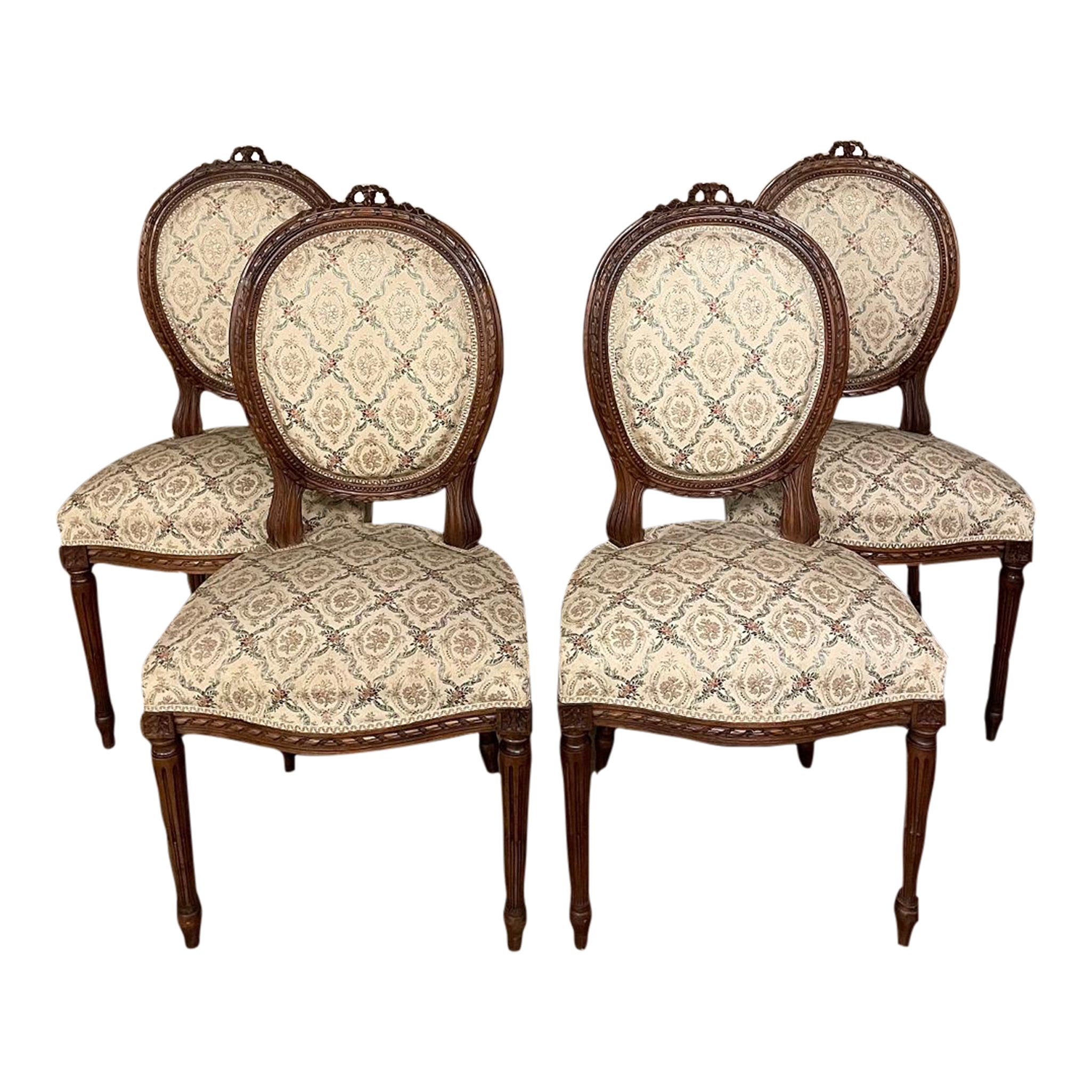 Set of Four 19th Century French Louis XVI Walnut Chairs